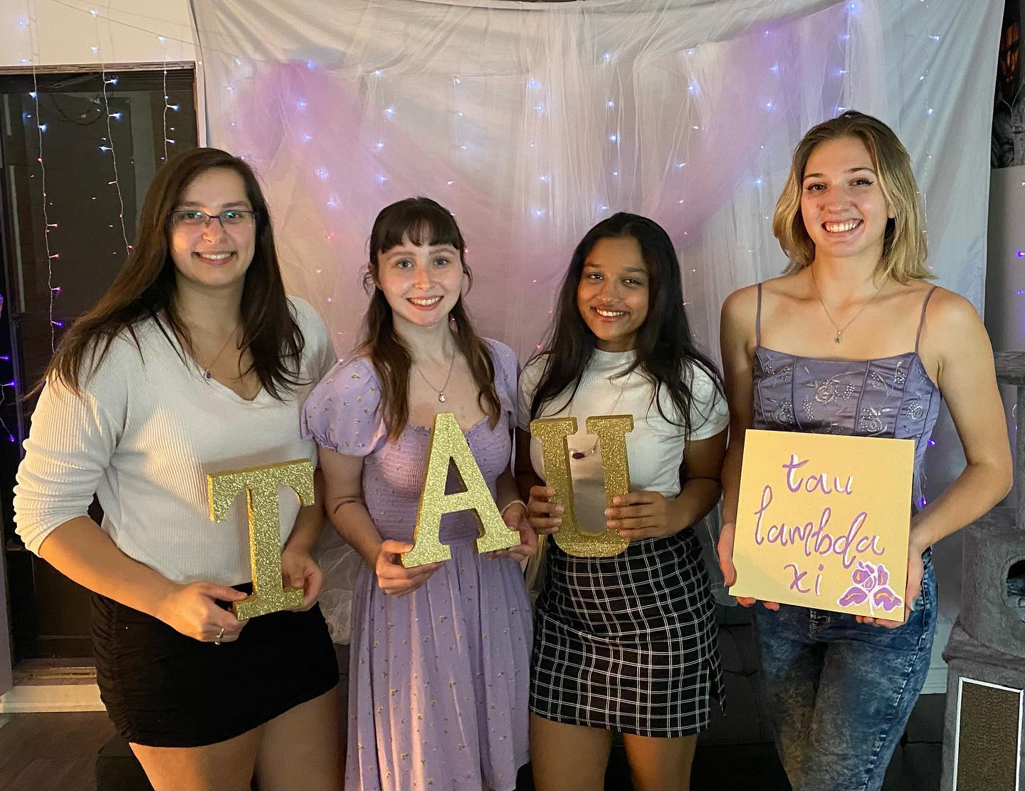 - Tau Lambda Xi Sorority